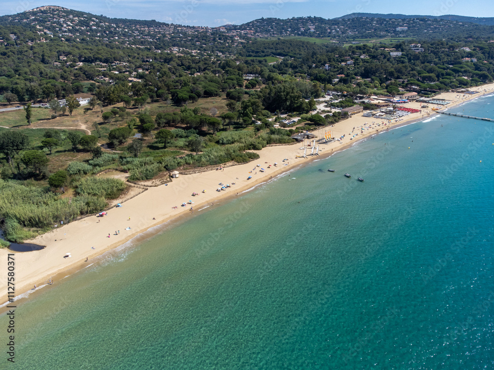 Aerial view on boats, crystal clear blue water of Plage du Debarquement ...