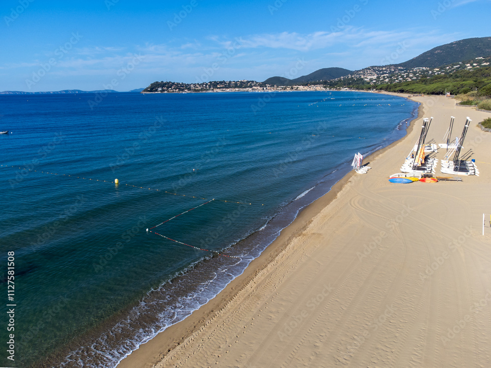 Aerial view on boats, crystal clear blue water of Plage du Debarquement ...