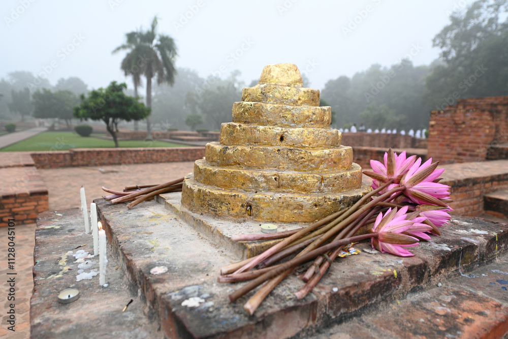 November 15, 2024. The small golden pagoda on the old brick altar in ...