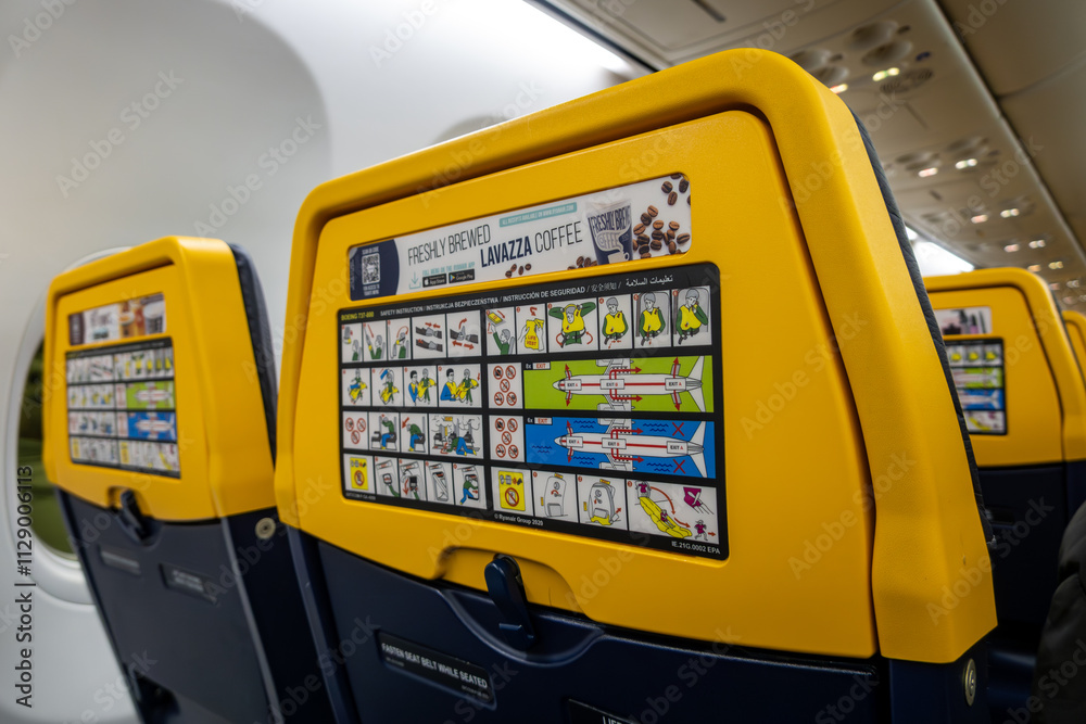 Stockholm, Sweden: The yellow seatback of a Ryanair flight with food ...
