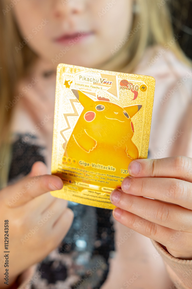 Young enthusiast, child displays collection Pokemon card, trading and ...