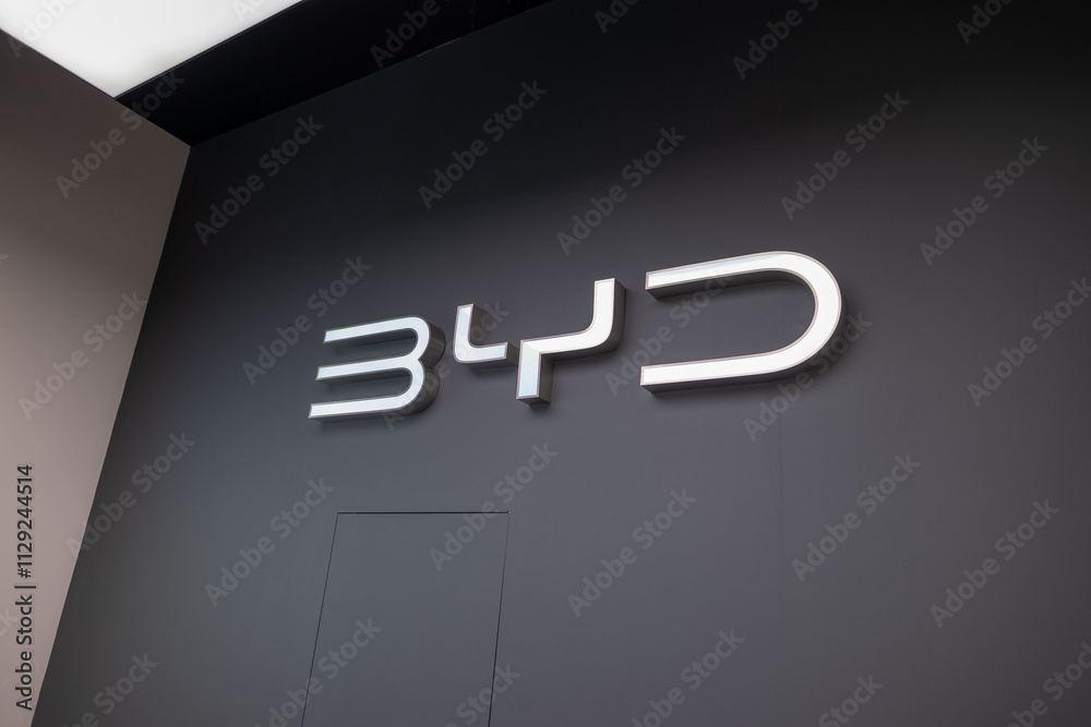 glowing Advertising banners BYD on black background, Chinese ...