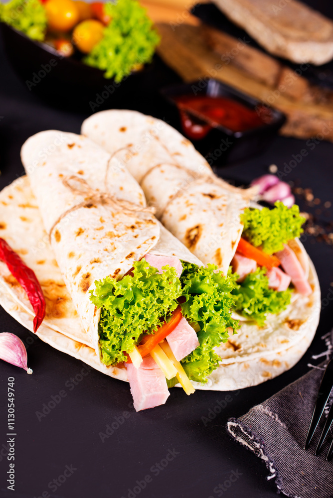 Shawarma sandwich, fresh roll of lavash (pita bread) pork shawarma with ...