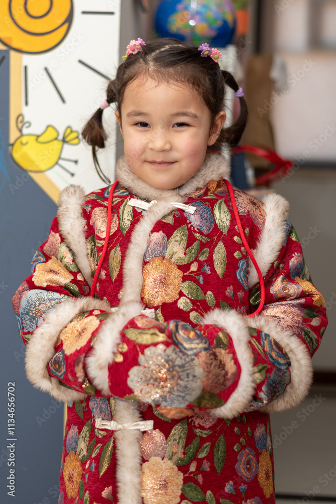 Small Chinese, multiracial girl is ready for a celebration of Chinese ...