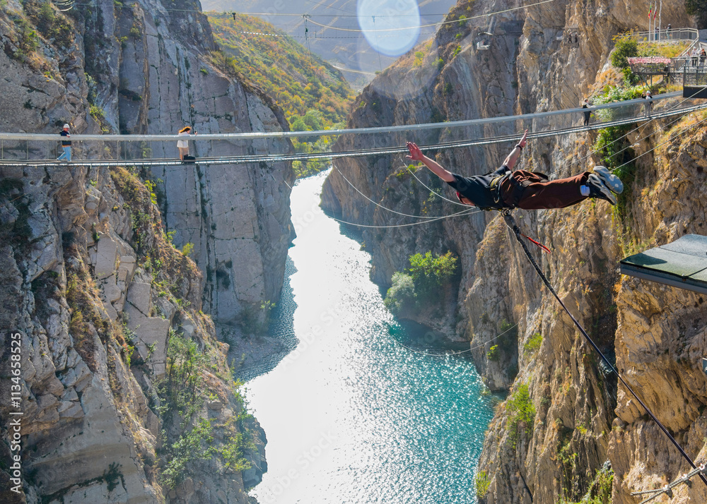 Stock-Foto „jumper was bouncing off the bungee jumping platform down ...