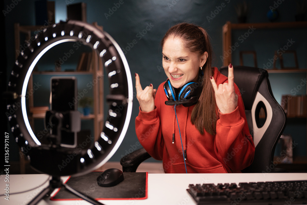 Woman gamer blogger influencer streaming live with her subscribers ...