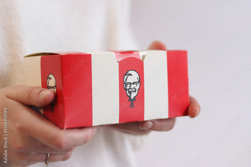 Kyiv, Ukraine - December 15, 2024: Cardboard box with food from KFC ...