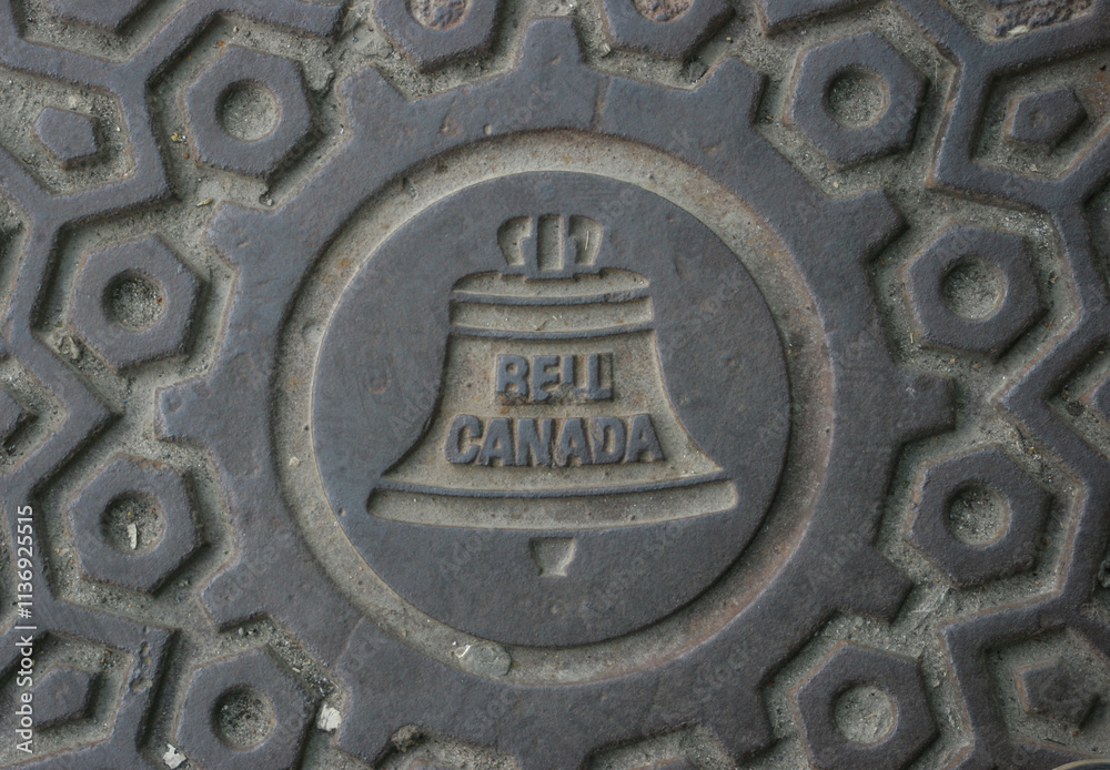 Bell Canada legacy logo on a telephone manhole cover. Bell Canada is a ...