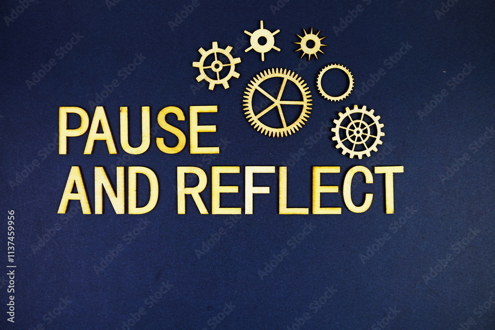 Pause and Reflect alphabet letters with gears element on navy blue ...