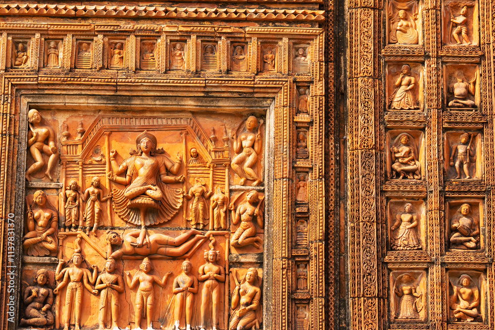 Terracotta sculpture of Tripura Sundari Goddess sitting on a lotus ...