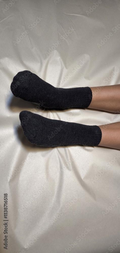Women's feet in socks Stock Photo | Adobe Stock