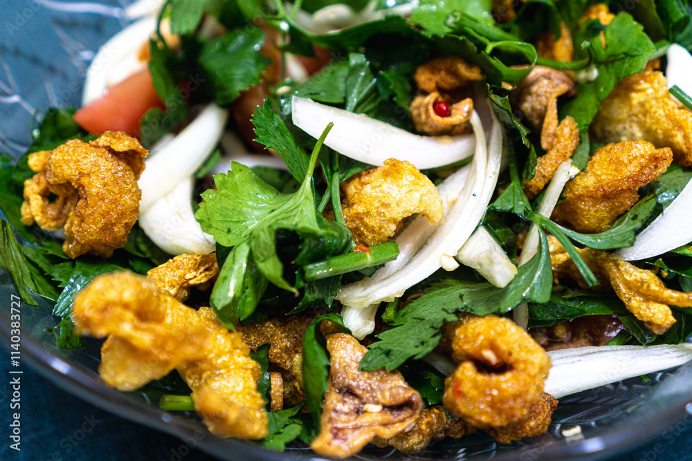 Traditional Thai spicy crispy salad, "Yum Sam Krob," featuring fried ...
