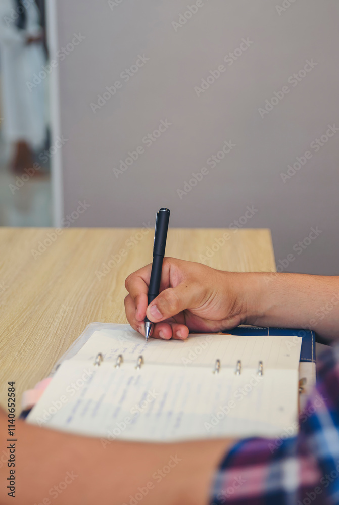 Man hand write Schedule Calendar and reminder agenda, plan daily ...