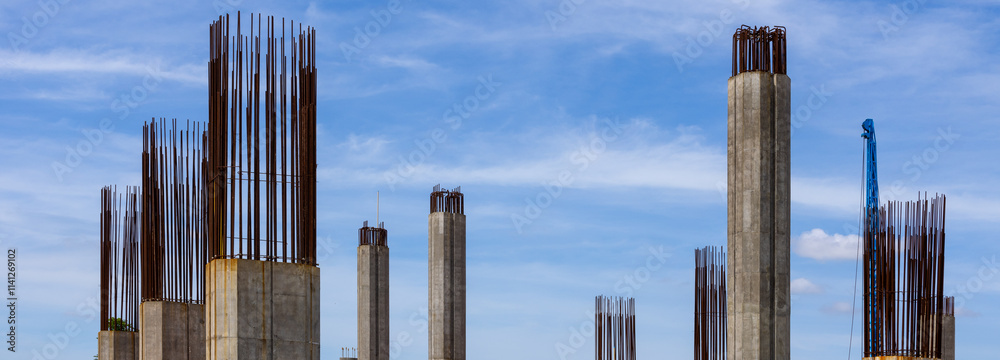 New construction site with crane and mechanical equipments on sunset ...