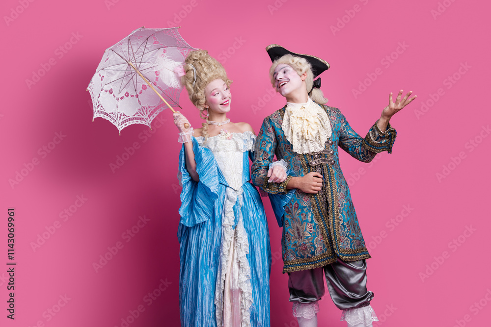 Captivating couple in elegant baroque attire poses against a vibrant ...