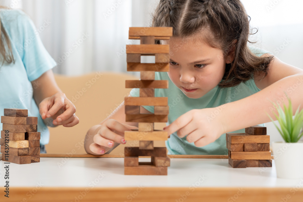 child playing and learning toy blocks. children are very happy and ...