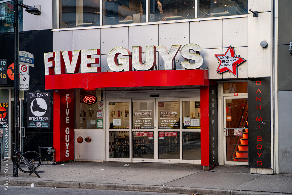 Five Guys restaurant logo sign in Downtown Toronto. Five Guys Burgers ...