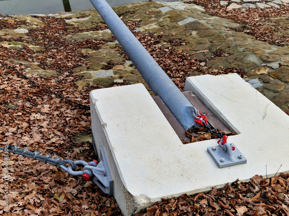 anchoring concrete footings hold the concrete floating pier by the ...