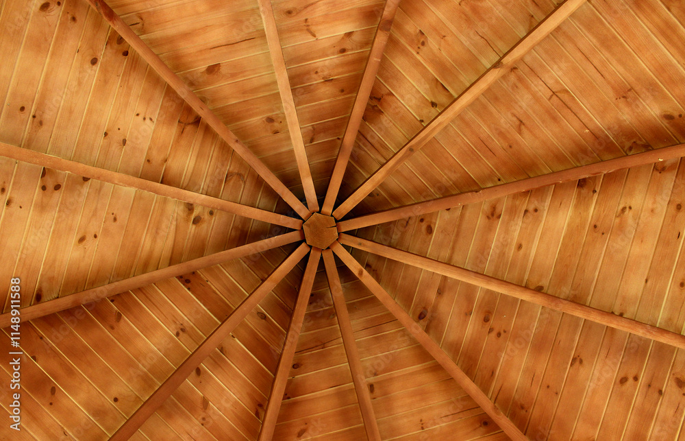 Interior of a vaulted wooden roof made from rough planks. Timber house ...