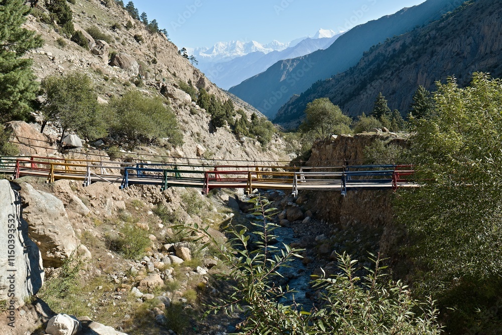 Bridge over Tato Gah river in Tato village. Himalayas. Gilgit-Baltistan ...