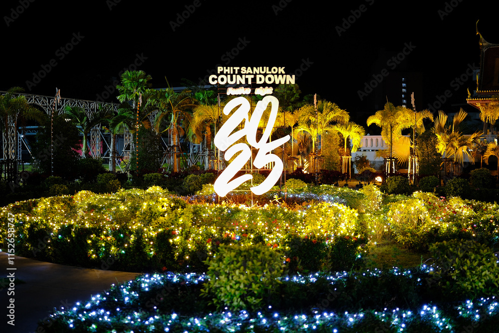 PHITSANULOK, THAILAND- December 24, 2024:Decorative lights to welcome the New Year 2025 in ...