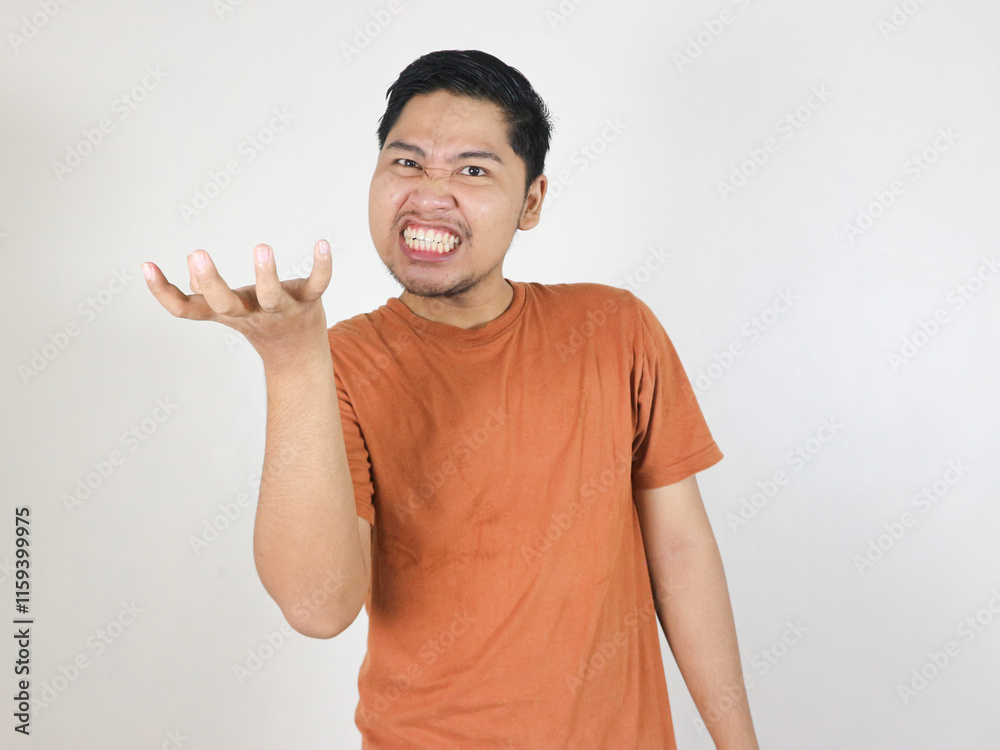 asian man looks very angry, confused and dizzy. virtigo . and gesture ...