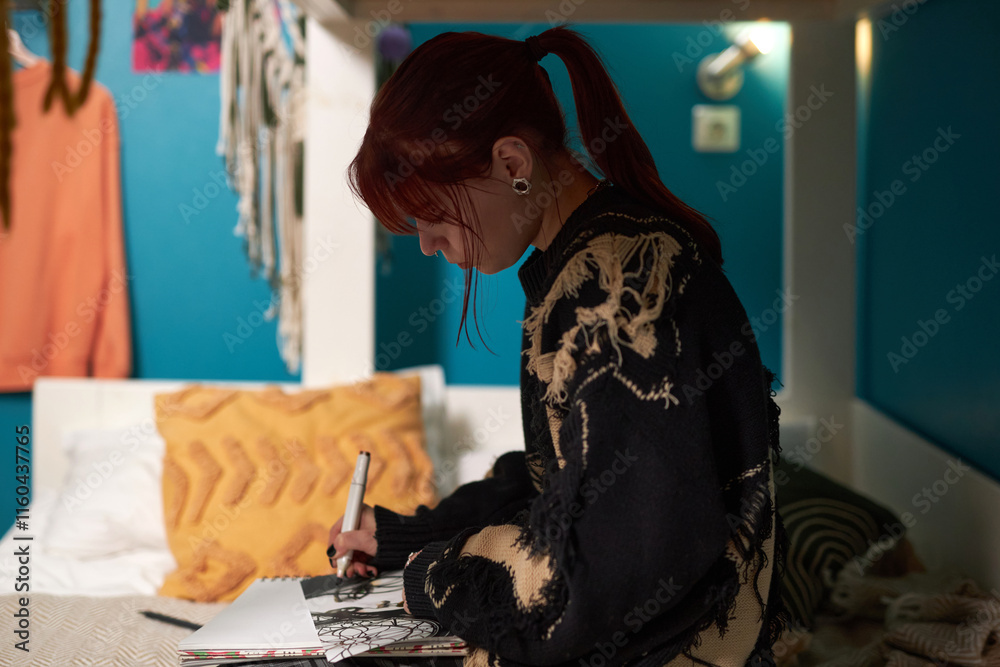 Side view of gen Z girl wearing y2k outfit sitting on bed in dorm room ...