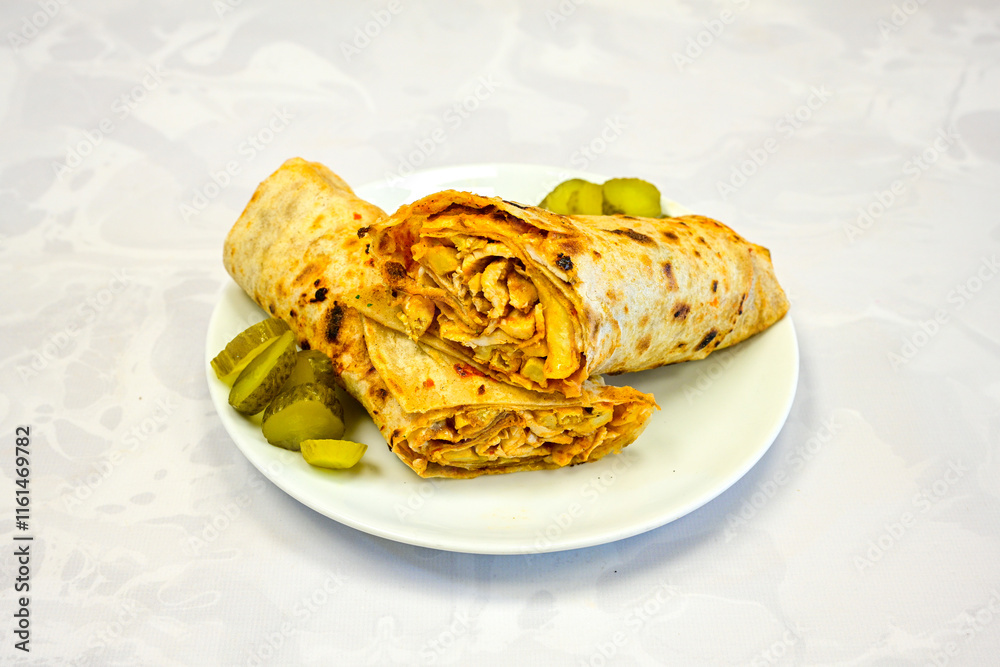 Stock-Foto „Lavash doner kebab ( soslu kasarli zurna doner durum ) or ...