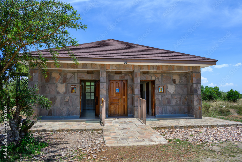 Modern public restroom building at entrance gate to Maasai Mara ...