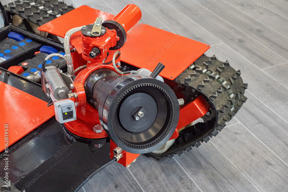 Fire extinguishing robot. Tracked unmanned all-terrain vehicle of ...