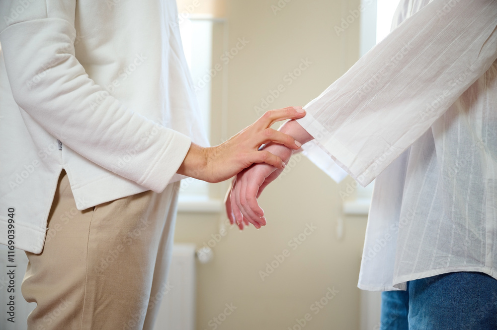 Crop view of chiropractor hands adjusting meridians of the human body ...