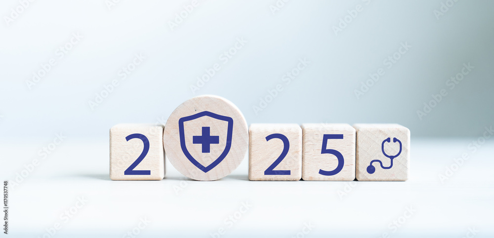 Health insurance concept Wooden cube with text 2025 and medical icons ...