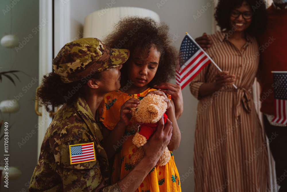 Us Veteran woman homecoming. Young woman coming back to her family from ...