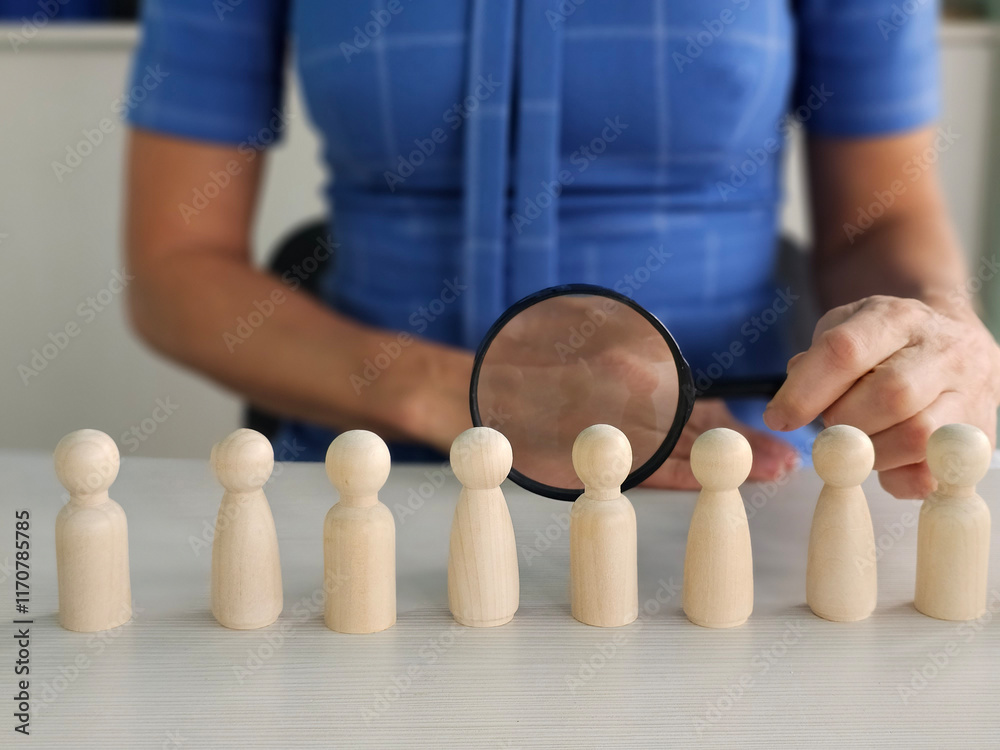 Searching for missing person in crowd of toy human figures with ...