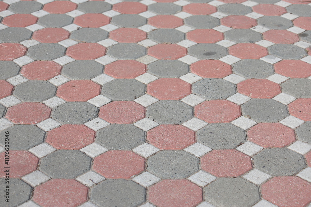 this stock photo showcases an interlock paving pattern, highlighting ...