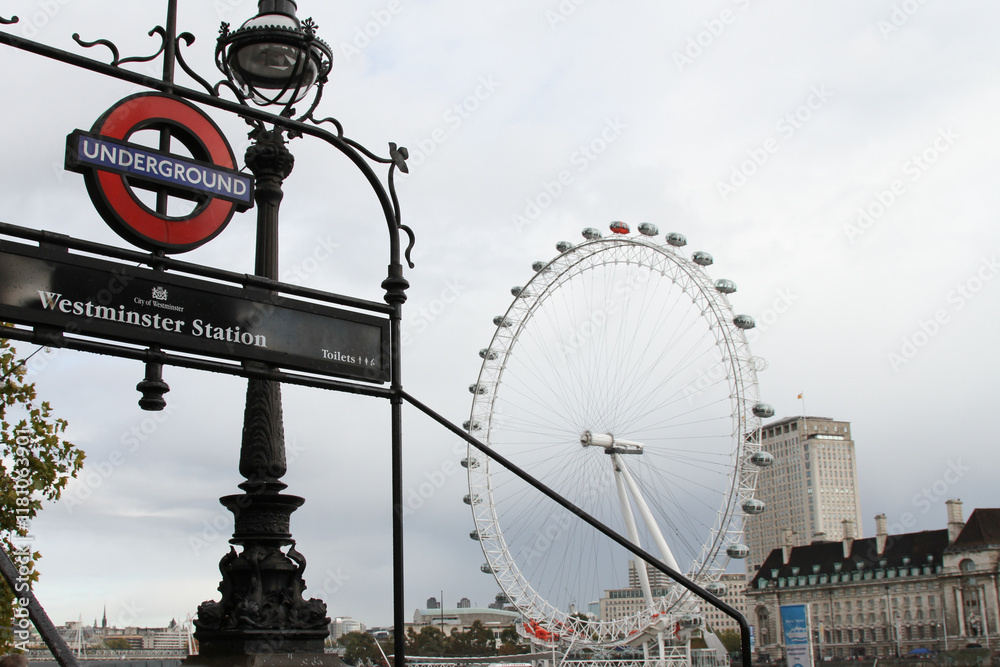 London Eye Millennium Wheel park tube station sign westminster station ...