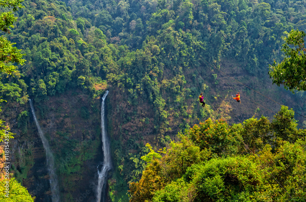 Zipline flights. Tad Fane waterfall in rainforest at Pakse and ...