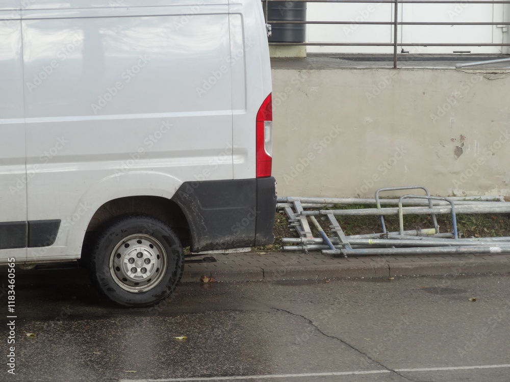 Construction van with scaffolding. Renovation and construction of ...
