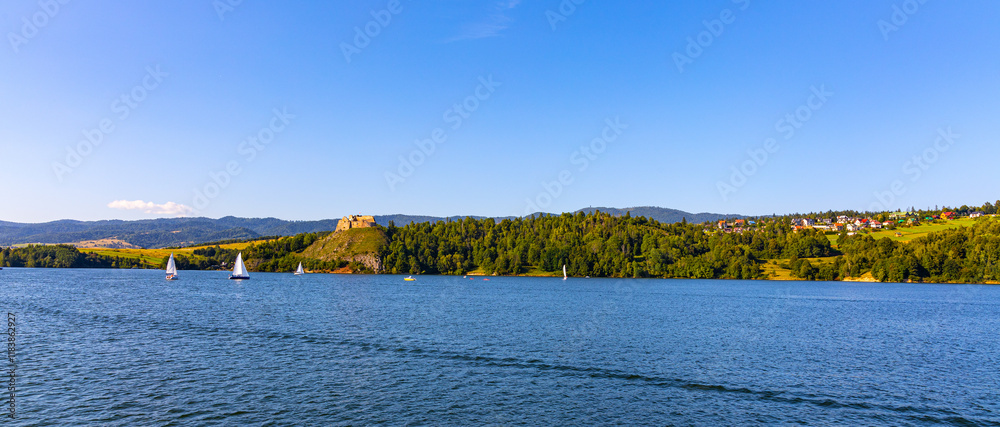 Ruins of medieval royal castle over Jezioro Czorsztynskie lake and ...