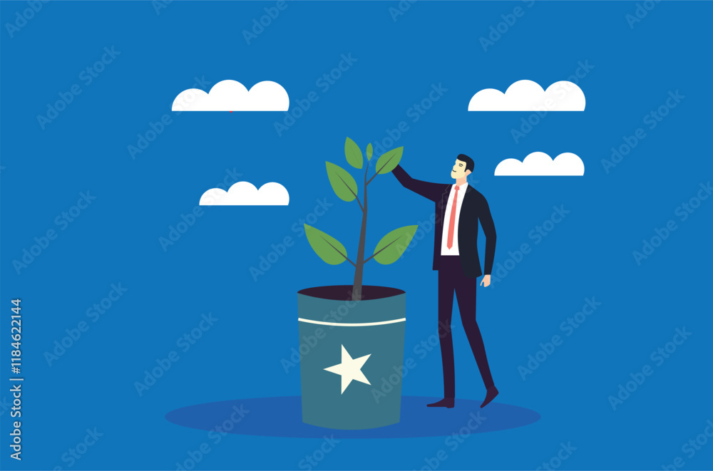Growing a greener future. A businessman tending to a sapling ...