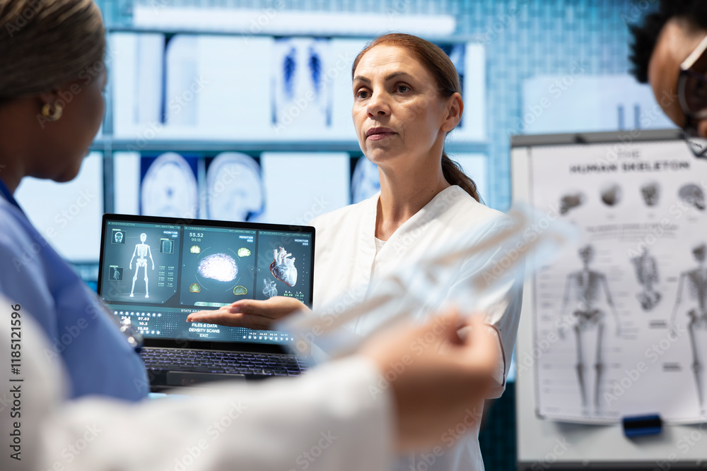 Radiologists doctors analyzing cardiology scans to detect heart ...