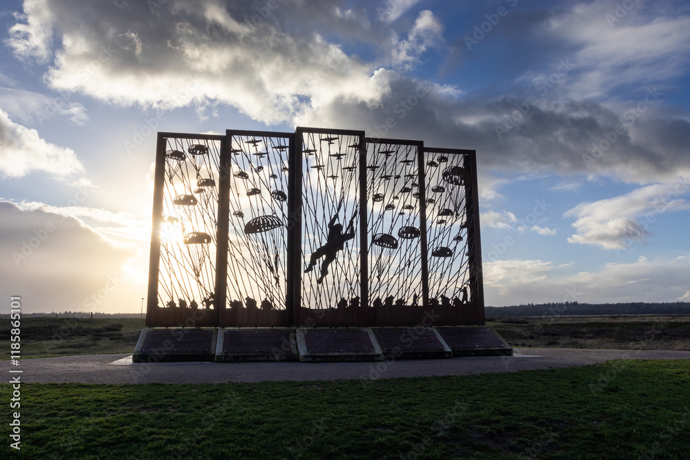EDE, NETHERLANDS, 2 JANUARY 2025: The Airbourne monument on Ginkel Heath against a setting sun ...