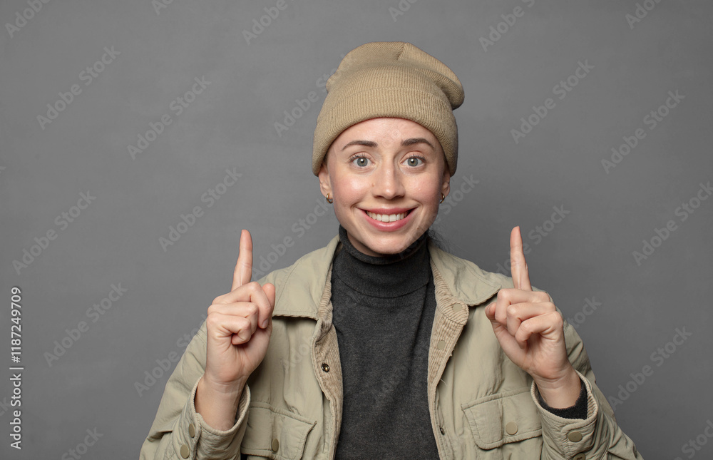 feeling awed and open mouthed pointing upwards with a shocked and ...