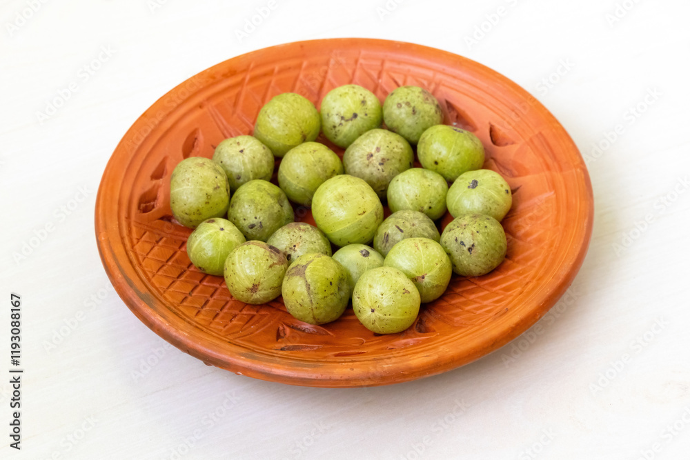 Amla fruits (Phyllanthus emblica), also called Indian gooseberry, are ...