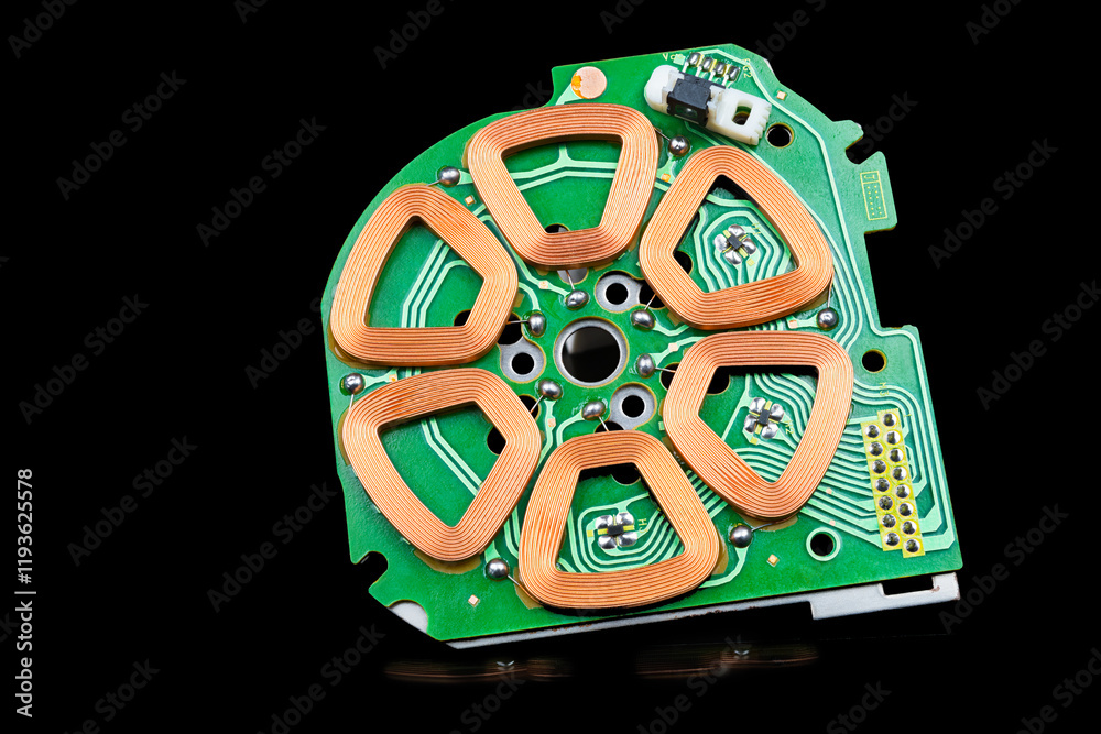 Close-up a stator of brushless DC electric motor on a black background ...