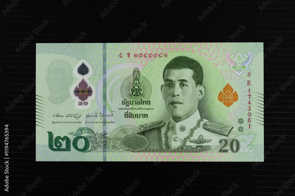 Thai 20 baht banknote with portrait of His Majesty King Maha ...