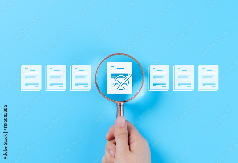 Document Review and Quality Control Process Concept. A hand holding a ...