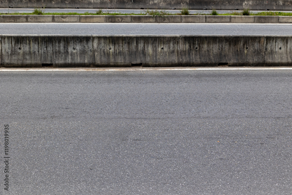 Urban highway divider with concrete barriers on asphalt road Stock ...