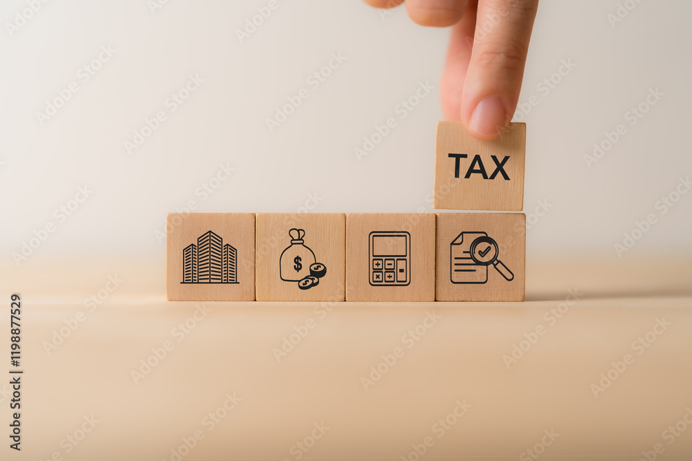 Tax, financial planning and management concept. A hand stacking wooden ...