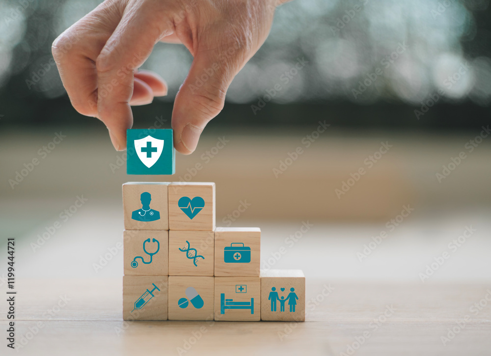 Hand holding wooden blocks, health insurance concept, medical wooden ...